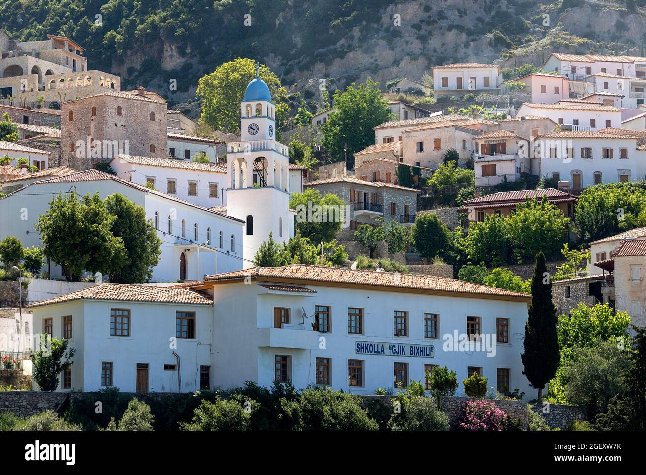 Church tower and the village of Dhermi (Dhermiu), Cikes massif ...
