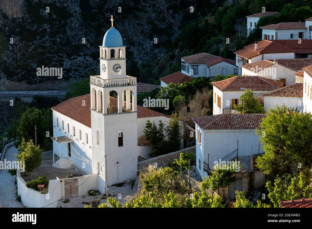 Church tower and the village of Dhermi (Dhermiu), Cikes massif ...