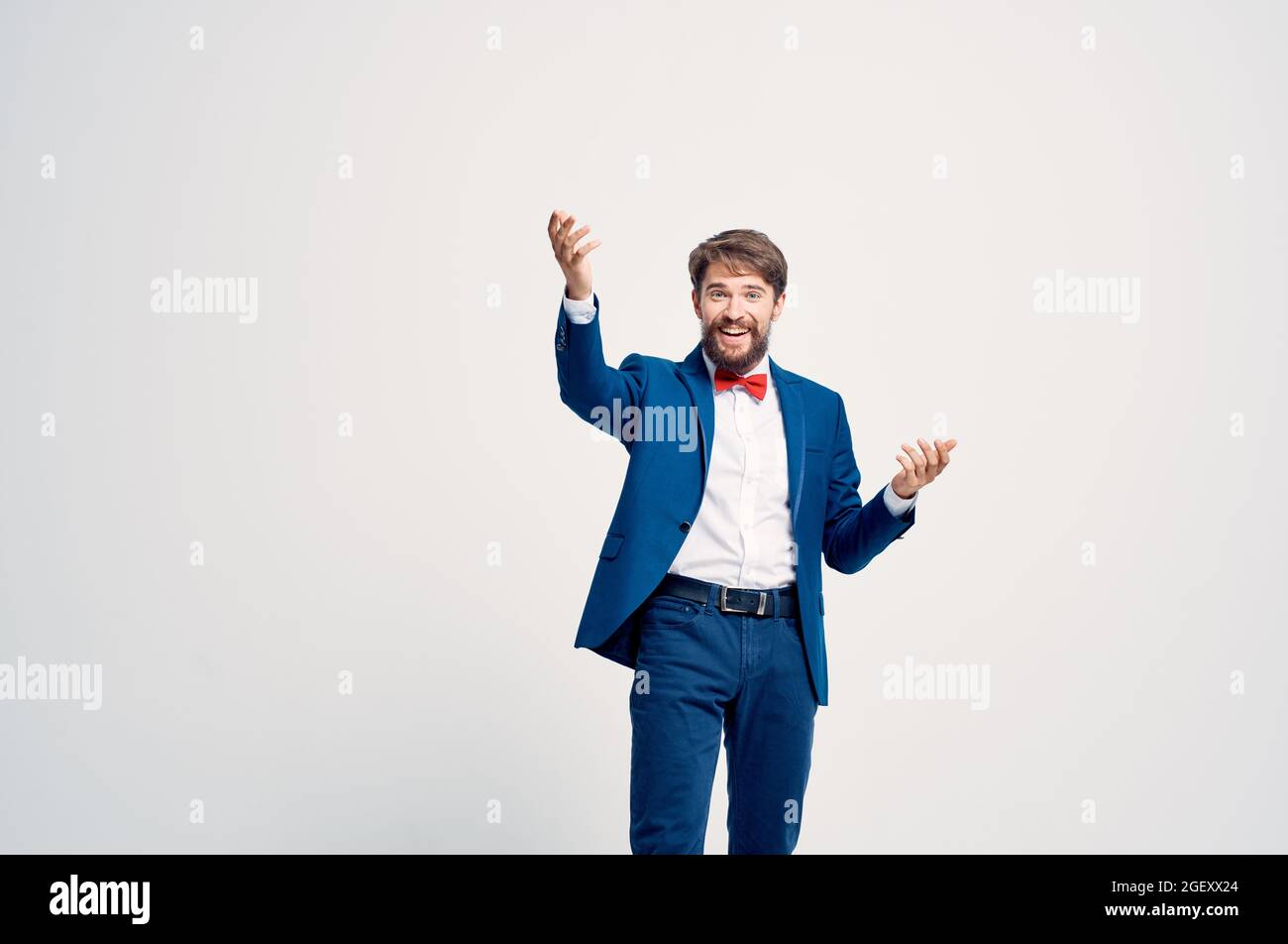 emotional man wearing bow tie suit posing isolated background Stock ...