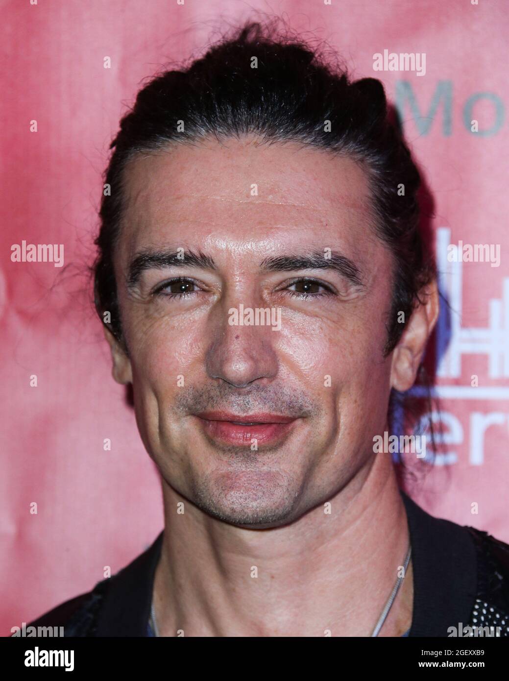 LOS ANGELES, CALIFORNIA, USA - AUGUST 21: Zimbabwean-British actor Adam ...