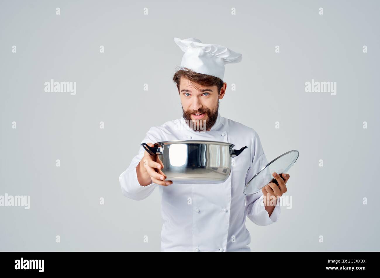male chef with white hat on his head restaurant kitchen service Stock ...