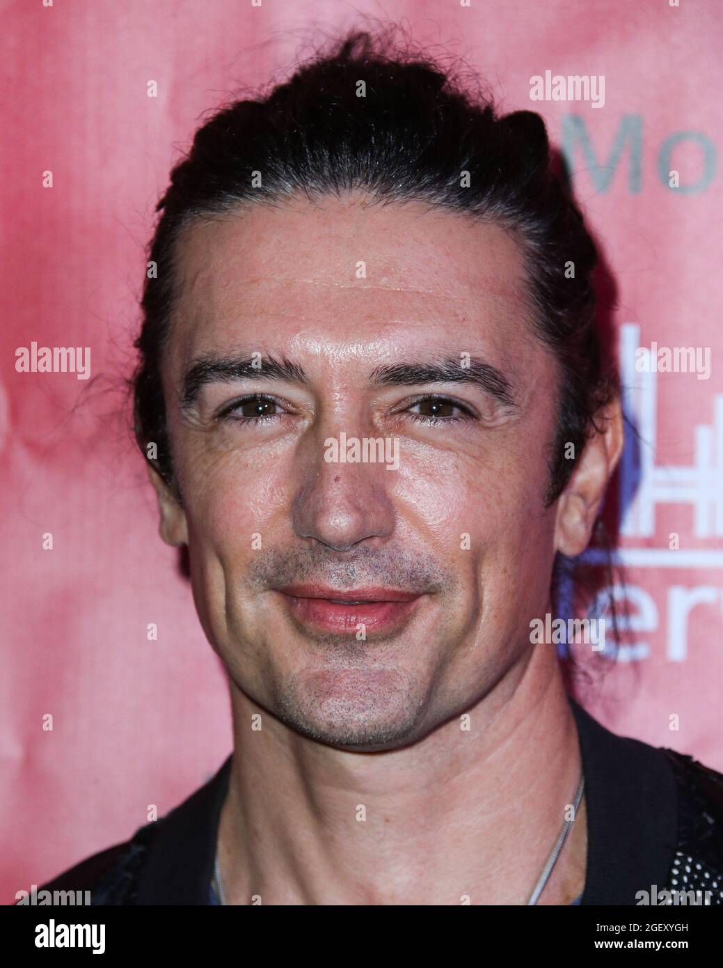 LOS ANGELES, CALIFORNIA, USA - AUGUST 21: Zimbabwean-British actor Adam ...