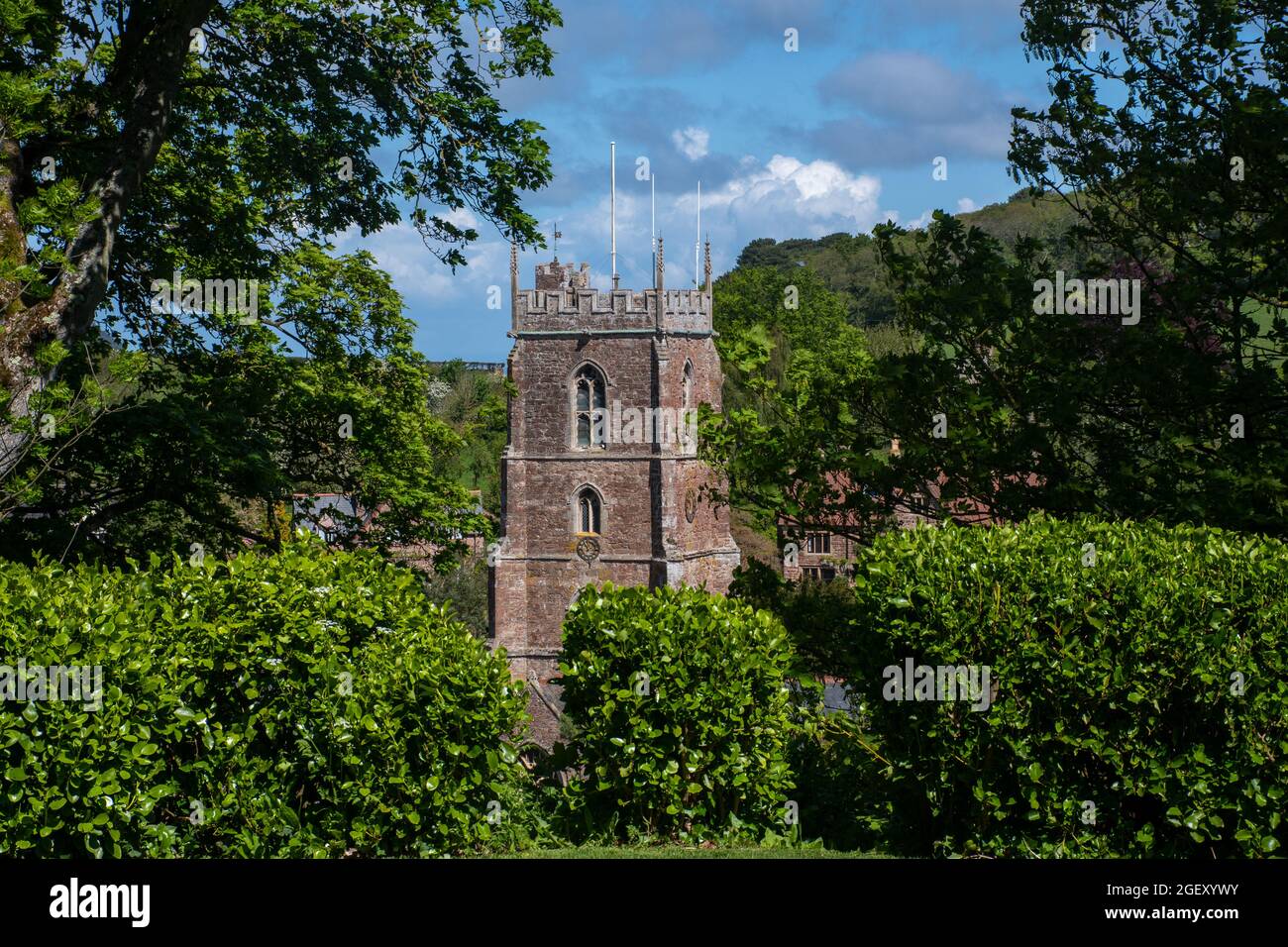 English Church Tower through trees Stock Photo - Alamy
