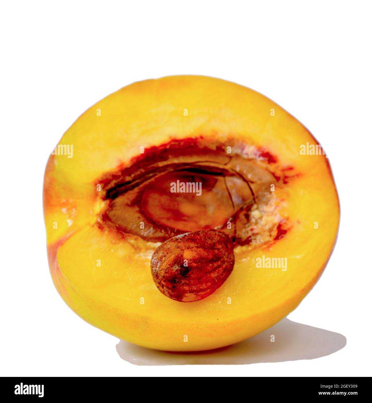 Beautiful peach half with seed isolated on white background Stock Photo ...