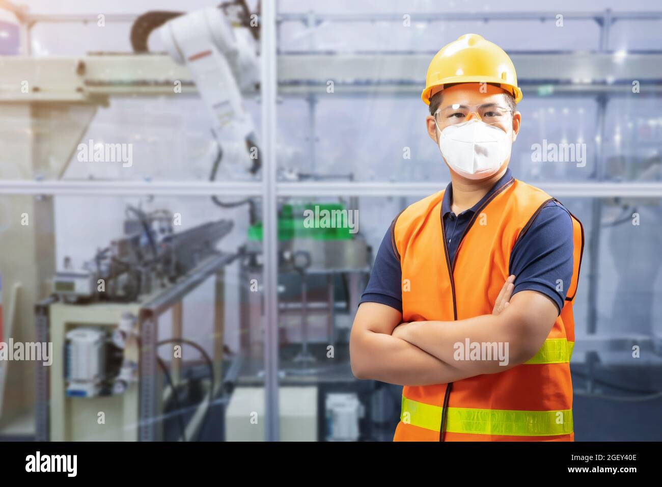 Asian engineer or technician wear safety helmet and reflective vest ...
