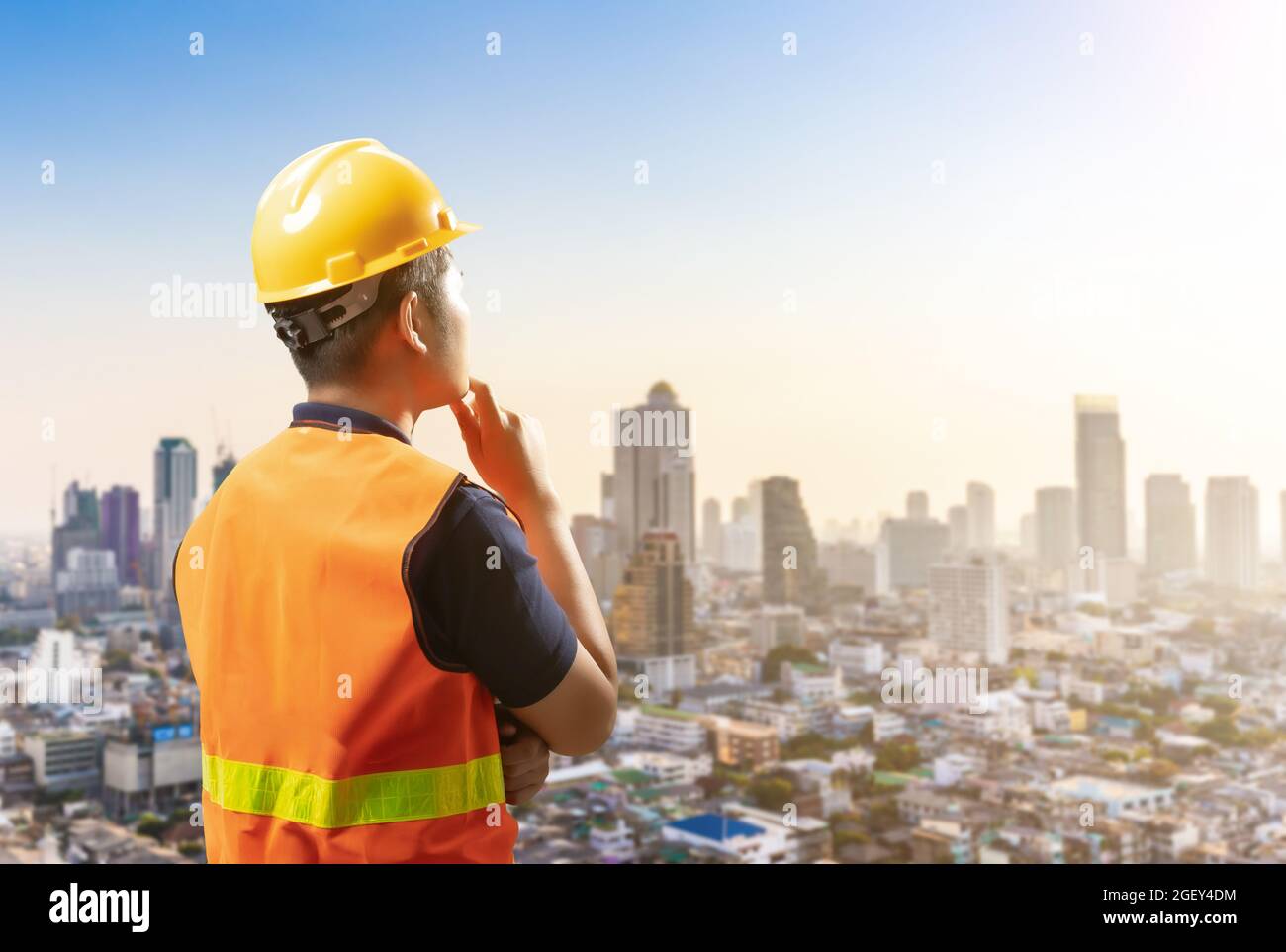 Construction business concept with civil engineer and cityscape ...