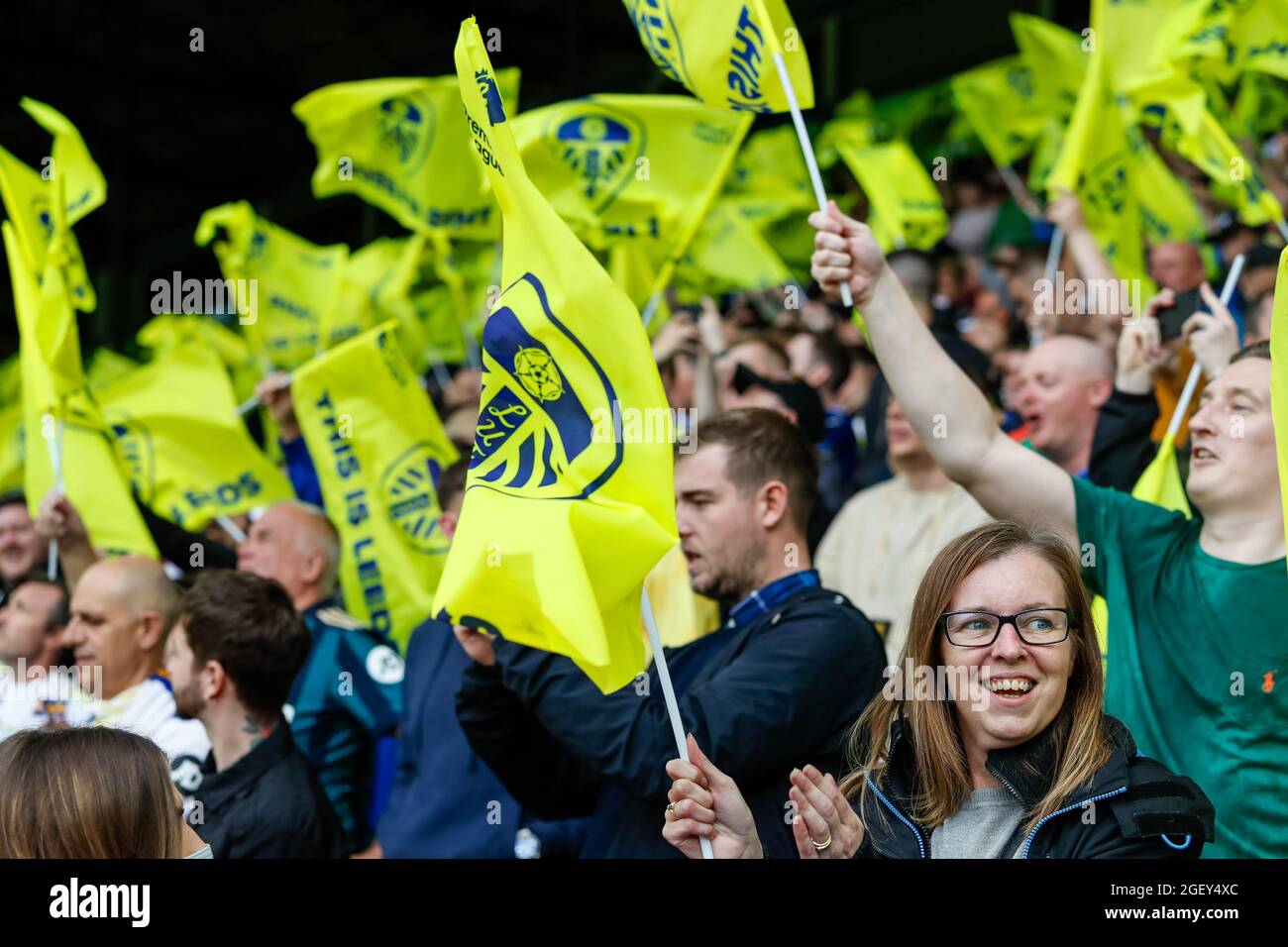 Leeds United fans wave flags before kick off Stock Photo - Alamy