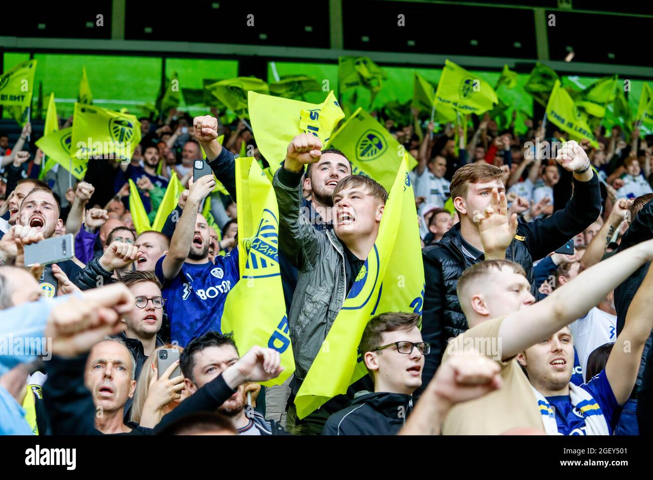 Leeds United fans wave flags before kick off Stock Photo - Alamy