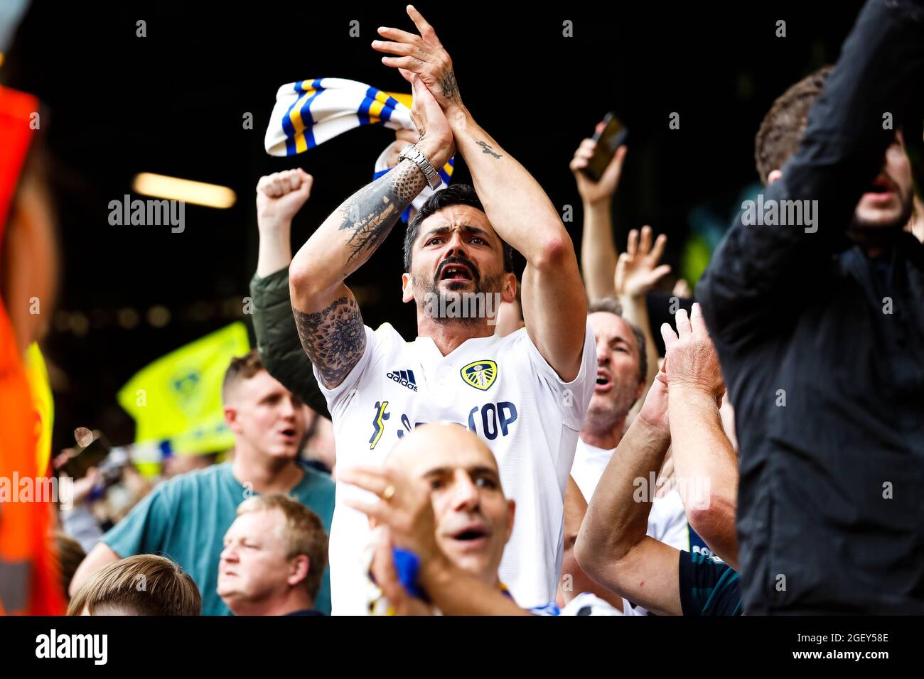 Leeds United fans in action during the game Stock Photo - Alamy