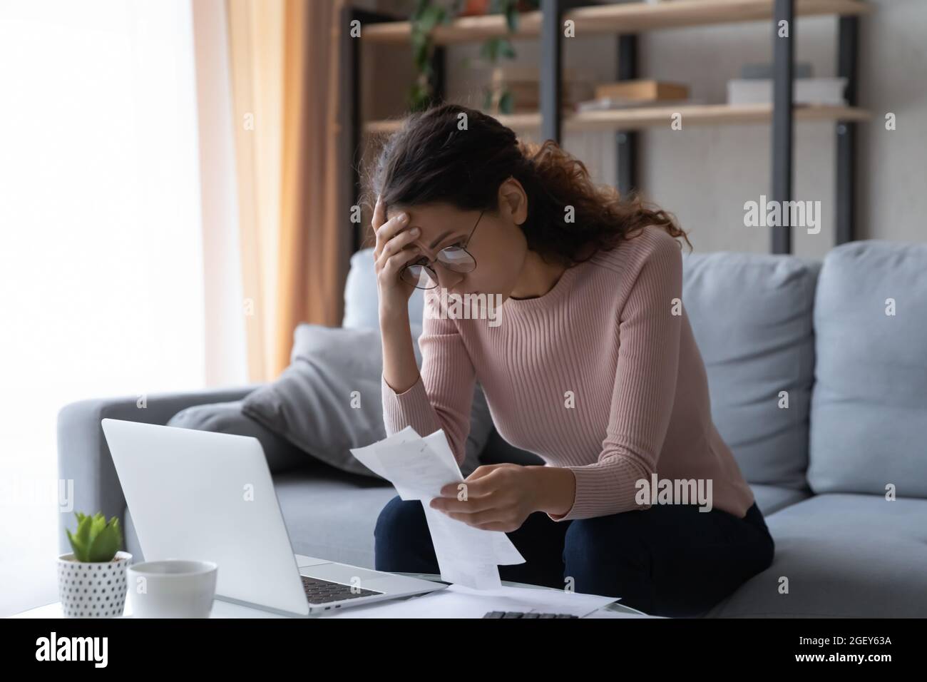 Woman feels desperate after expenses calculation having financial ...
