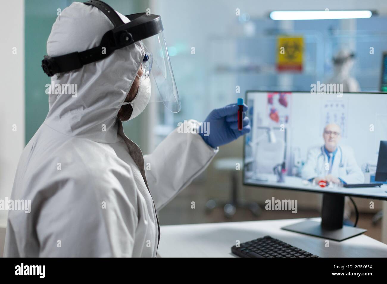 Scientist man doctor with ppe medical suit discussing medical expertise ...