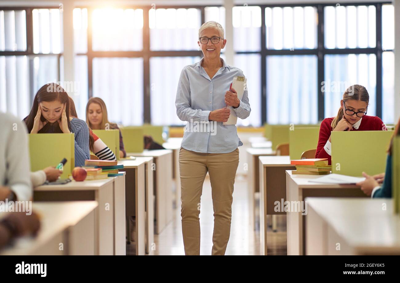 Female professor at a lecture in the classroom at the university Stock ...