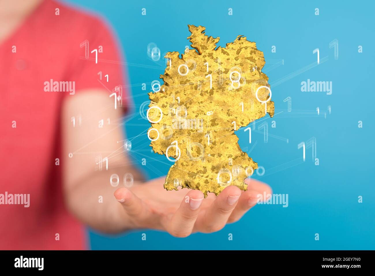 A digital illustration of a map of Germany and binary code on a hand ...