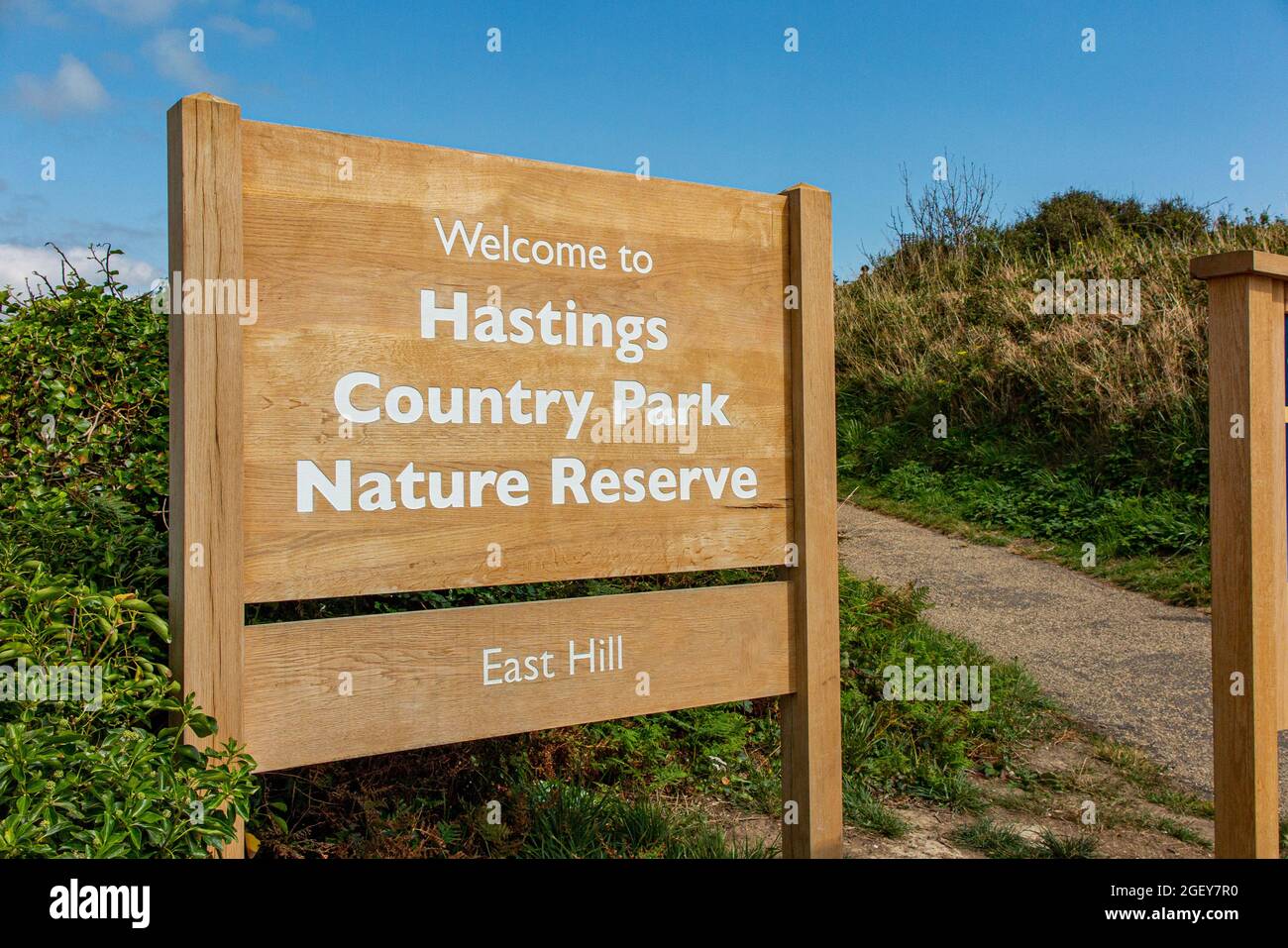 A sign for Hastings Country Park Nature Reserve above Hastings town in ...