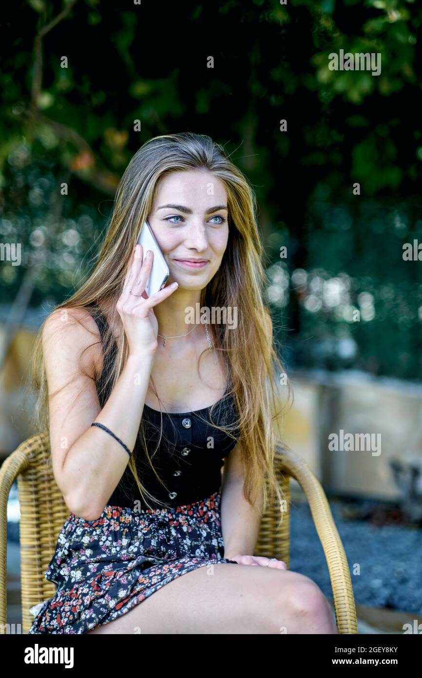 Natural beauty portrait of young woman in her 20s with long hair and ...