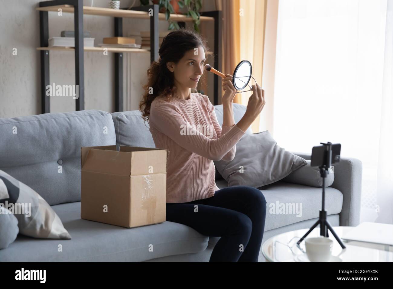 Woman influencer makeup powder hi-res stock photography and images - Alamy