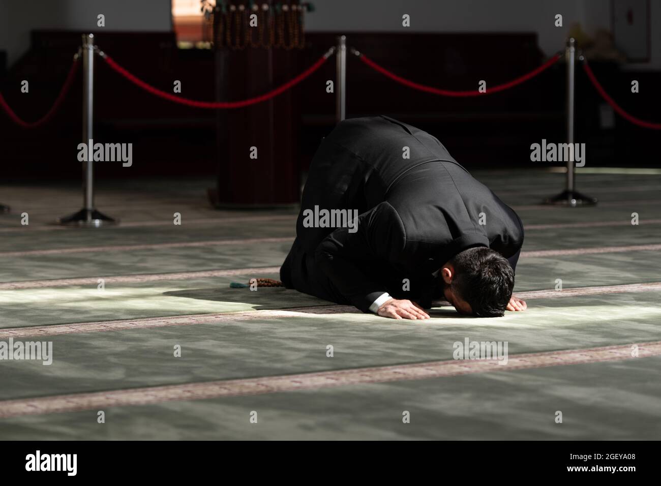 Attractive Man Making Traditional Prayer to God Allah in the Mosque ...