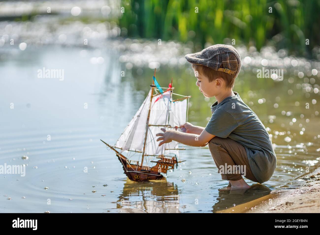 Boy river boat hi-res stock photography and images - Alamy