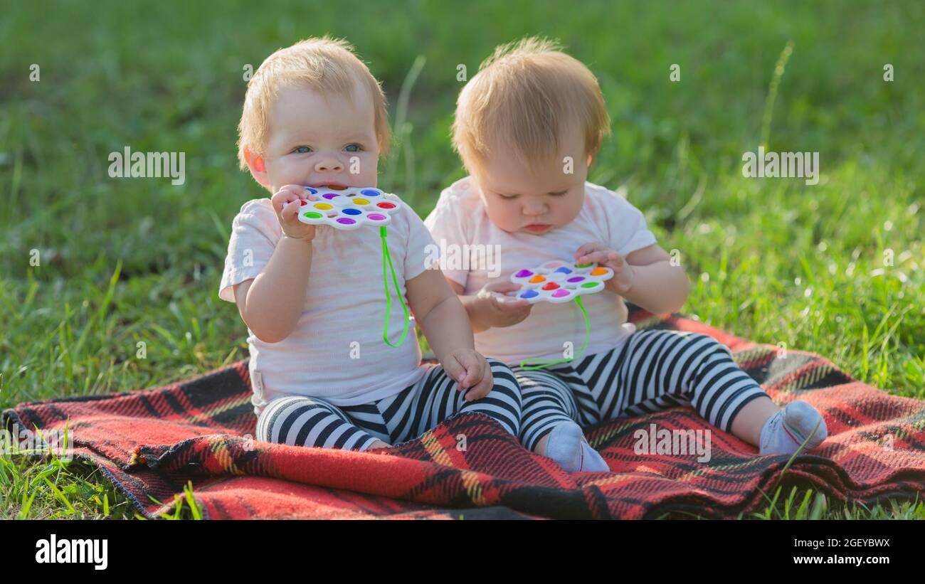 Portrait happy family parents twin hi-res stock photography and images ...