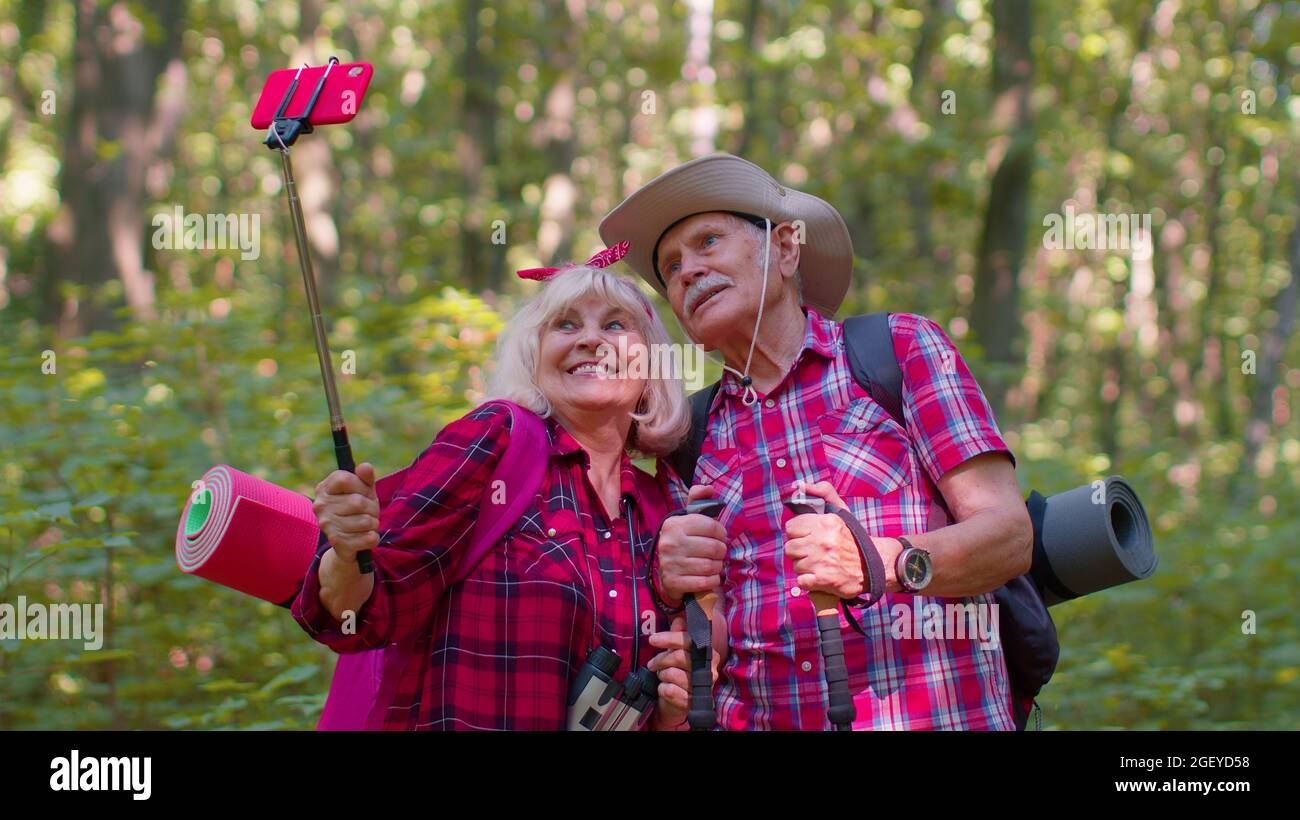 Senior grandmother grandfather blogger tourists taking selfie photo ...