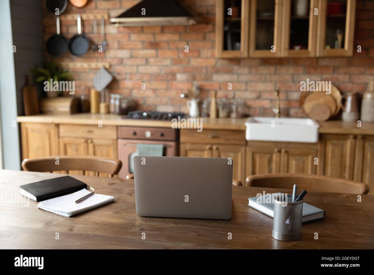 Work desk with computer in trendy apartment interior Stock Photo - Alamy