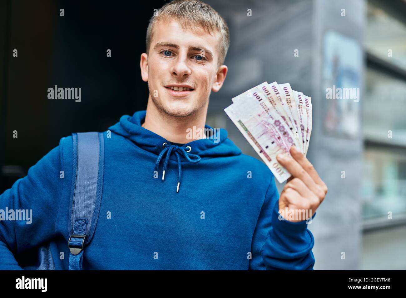 Man studying at banknote hi-res stock photography and images - Alamy