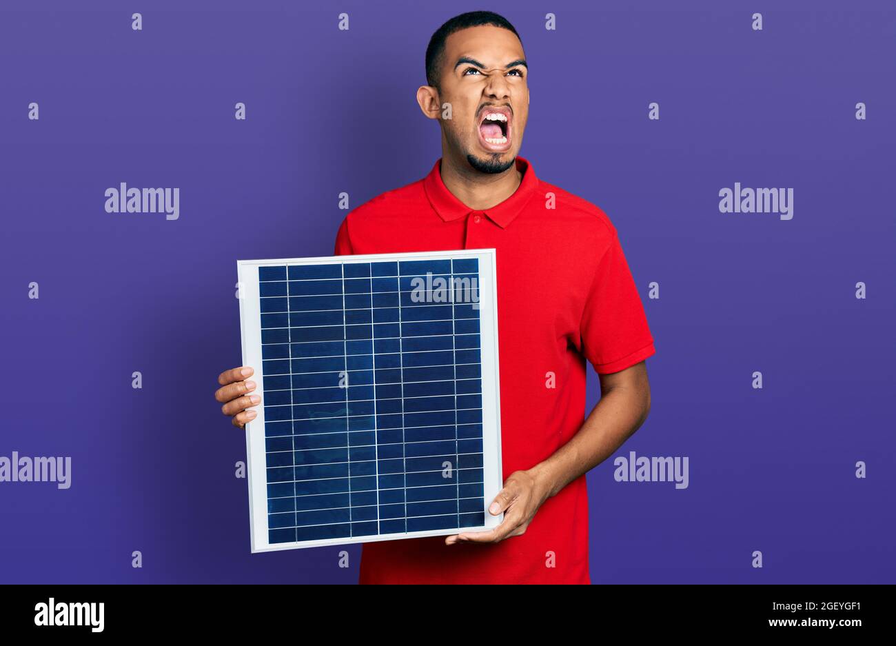 African man holding solar panel hi-res stock photography and images - Alamy