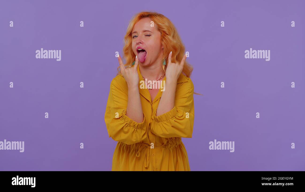 Rock hand signs female hi-res stock photography and images - Alamy