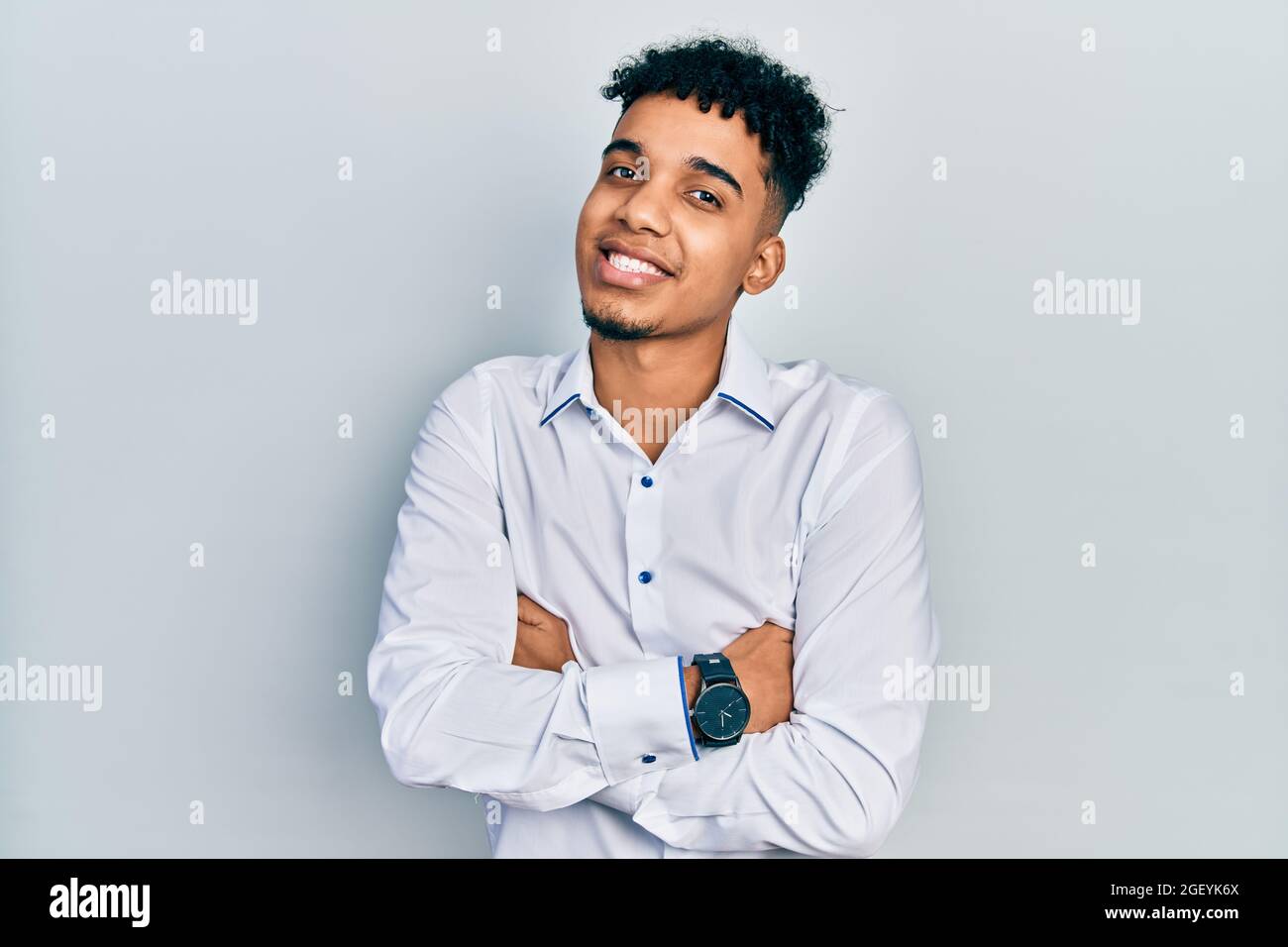 Young african american man wearing business shirt happy face smiling ...