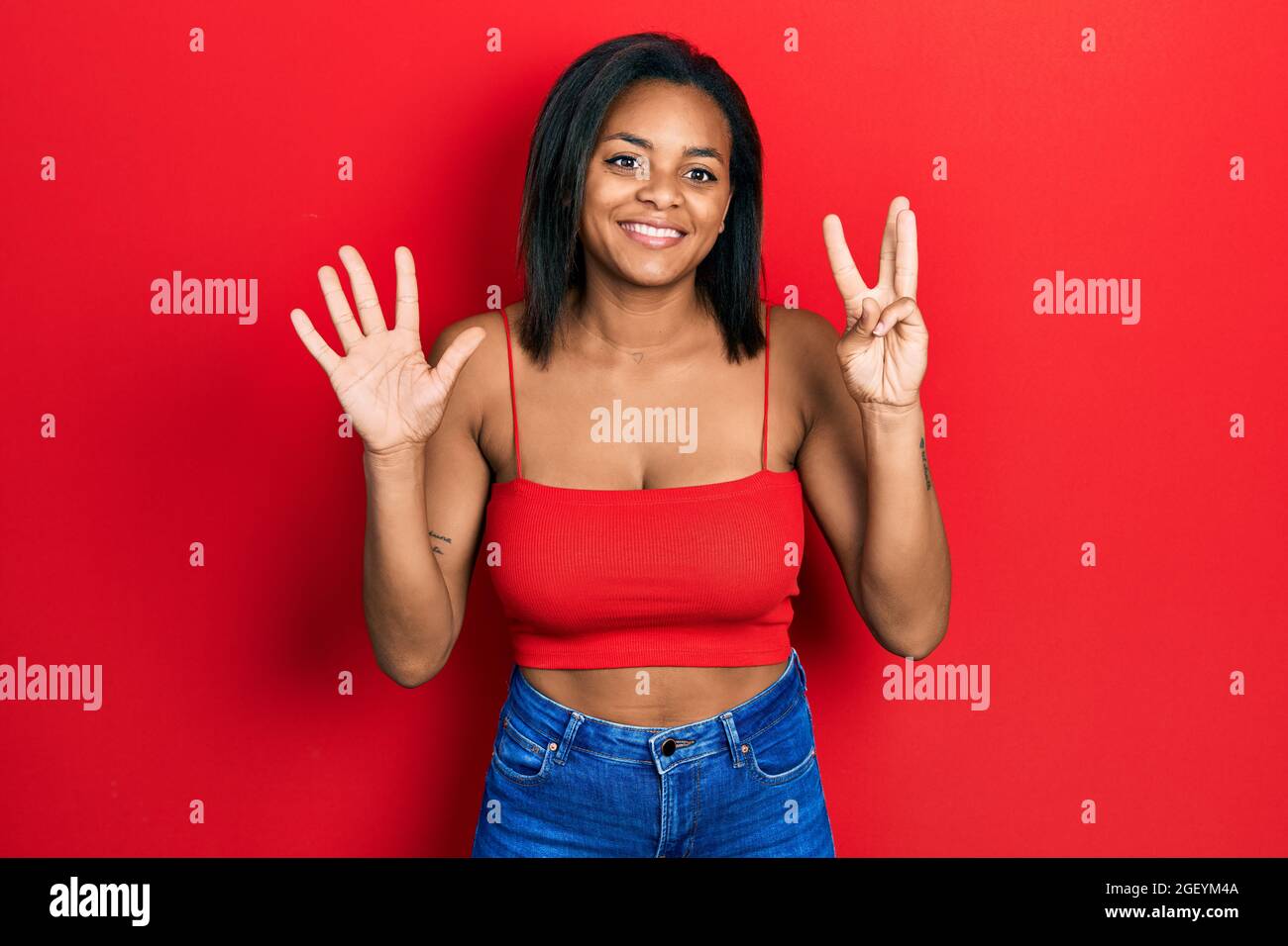 Young african american girl wearing casual style with sleeveless shirt ...