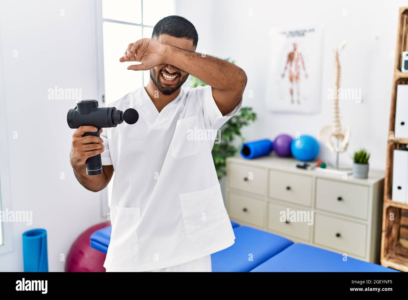 How to use a massage gun for recovery hi-res stock photography and ...