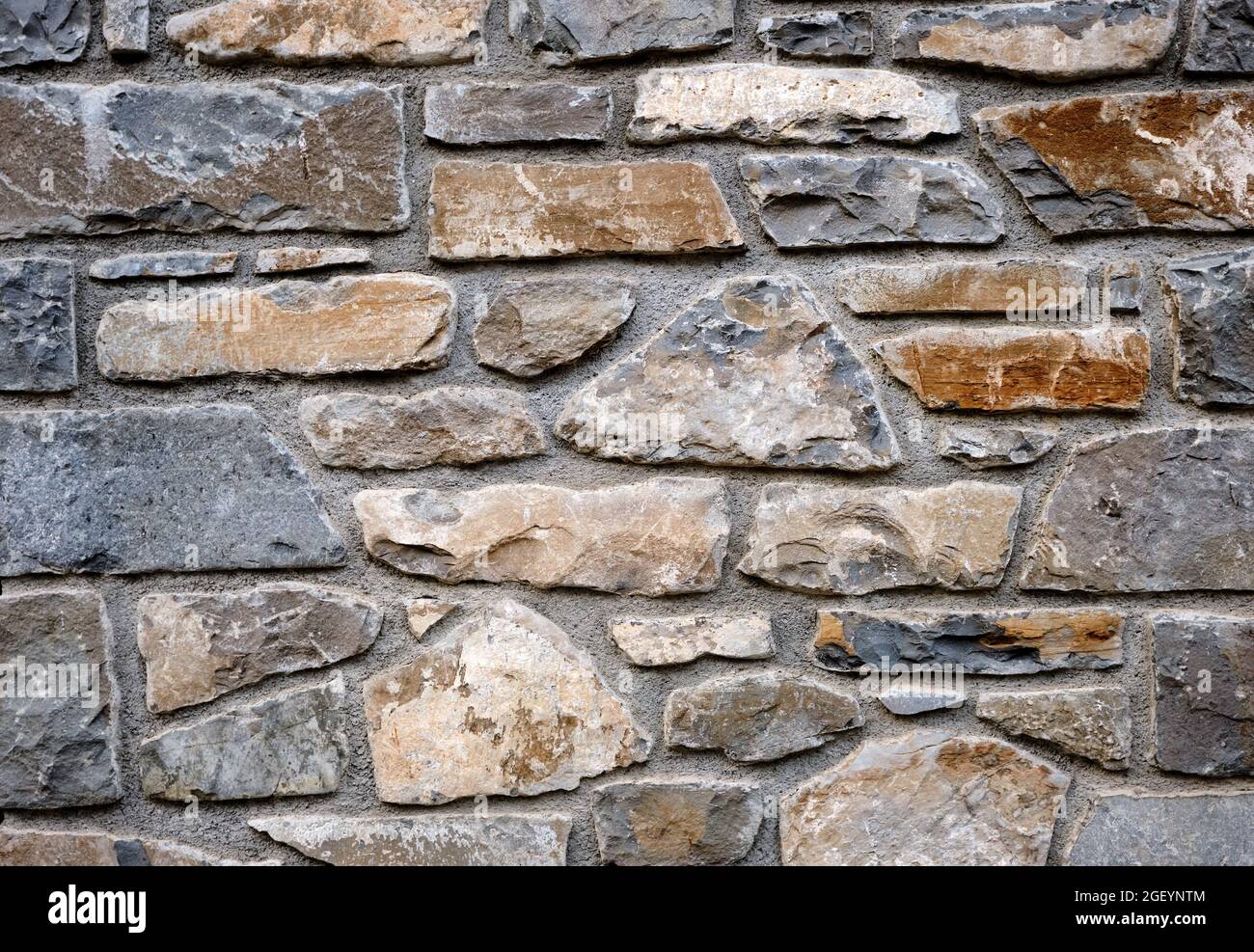 Background from an irregular natural stone wall Stock Photo - Alamy