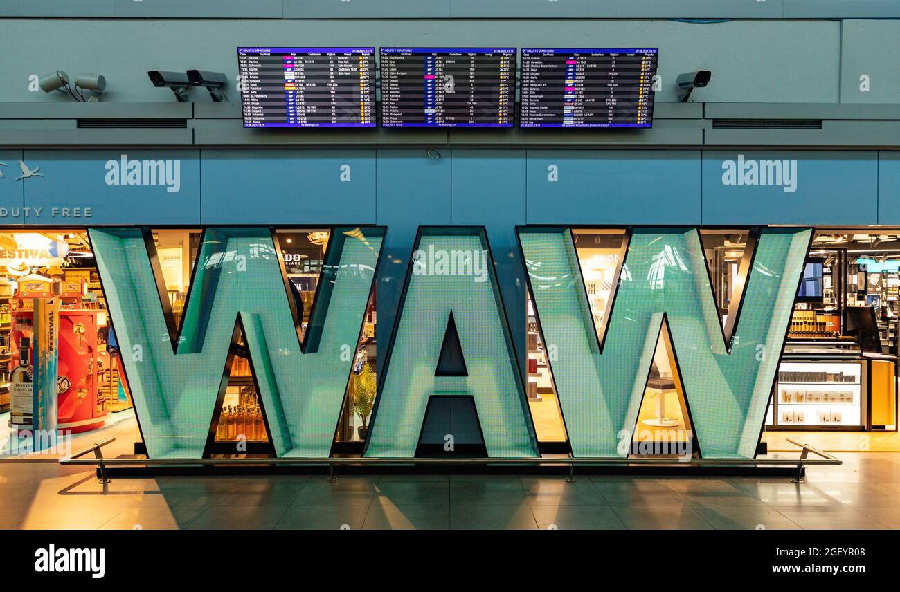 A picture of the WAW sign inside the Warsaw Chopin Airport Stock Photo ...