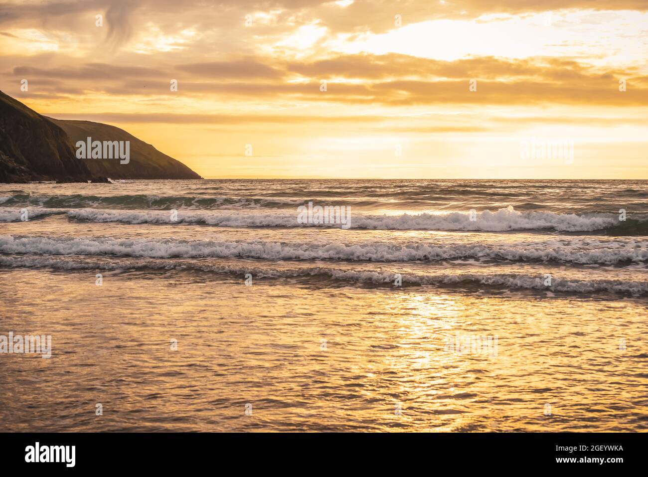 Waves bubbling on beach hi-res stock photography and images - Alamy