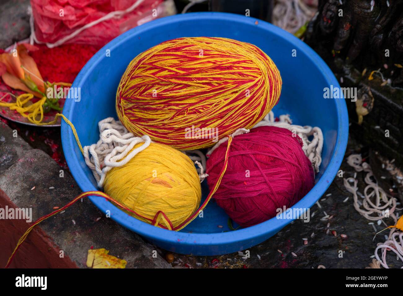 A view of the sacred colorful threads which are tied to the wrist of ...