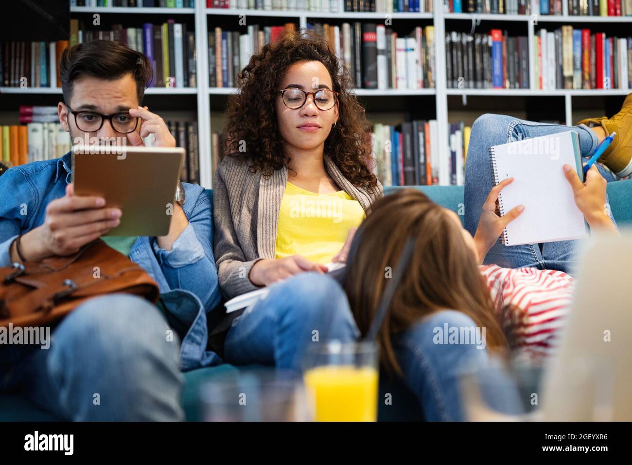 College, study, university and education concept. Group of tired ...