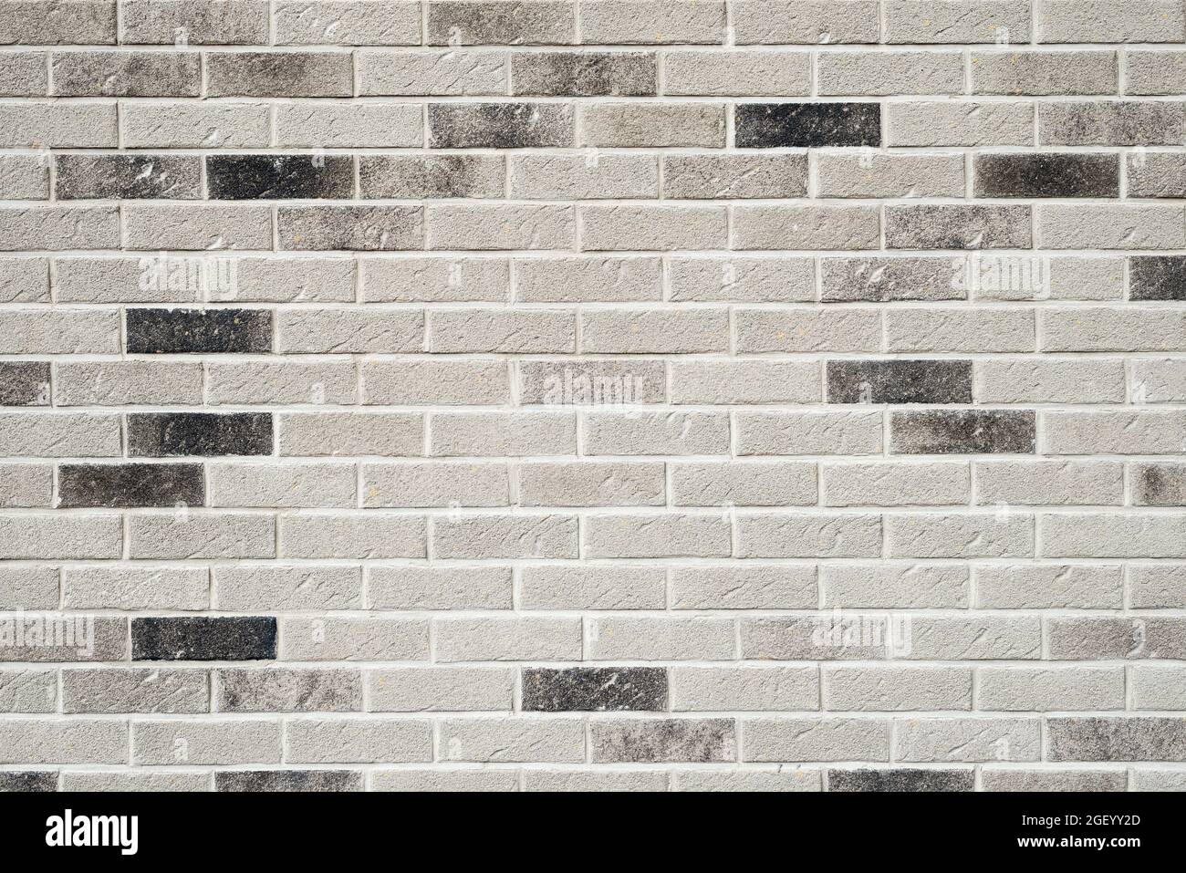 Gray brick wall background Stock Photo - Alamy