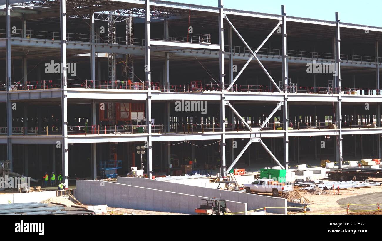 large construction site background, concrete and steel structure of a ...