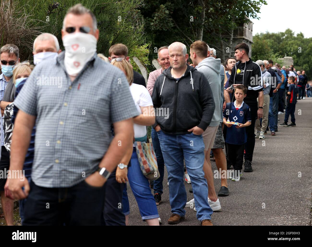 Ross County fans line up to get into the stadium prior to the cinch ...