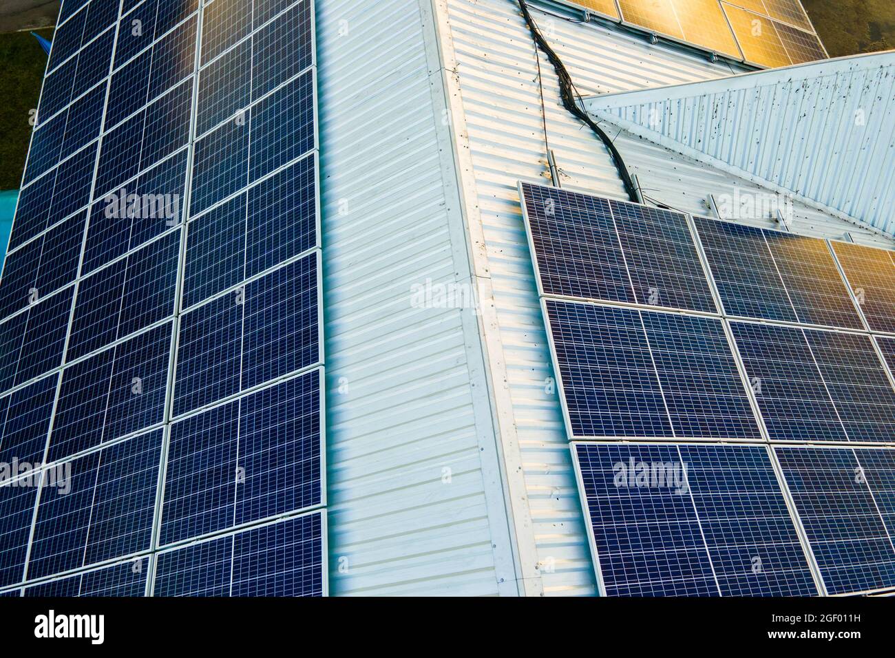 Aerial view of surface of blue photovoltaic solar panels mounted on ...