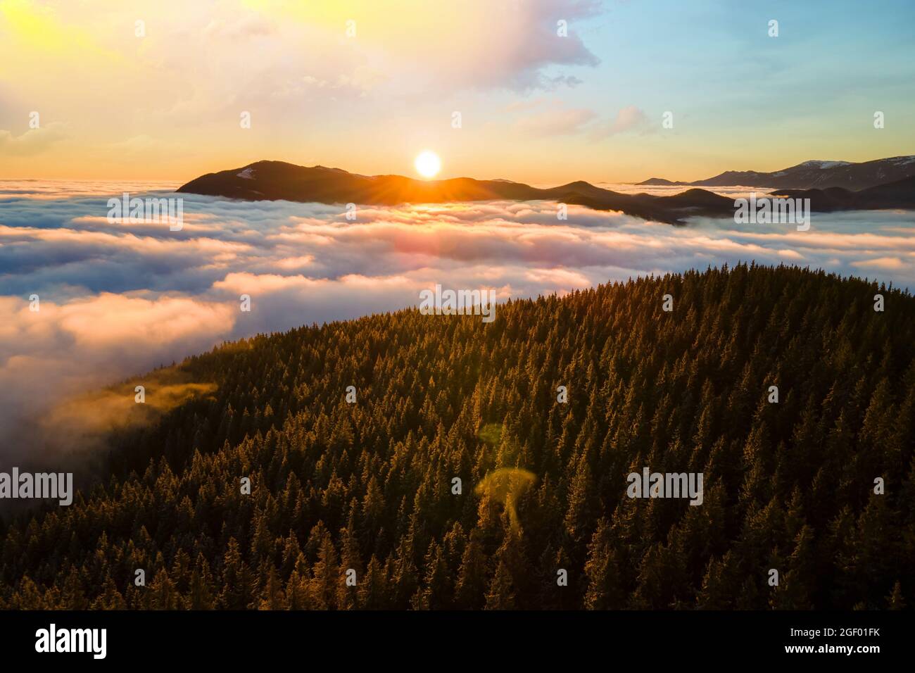 Sunlight over hills dense woodland hi-res stock photography and images ...