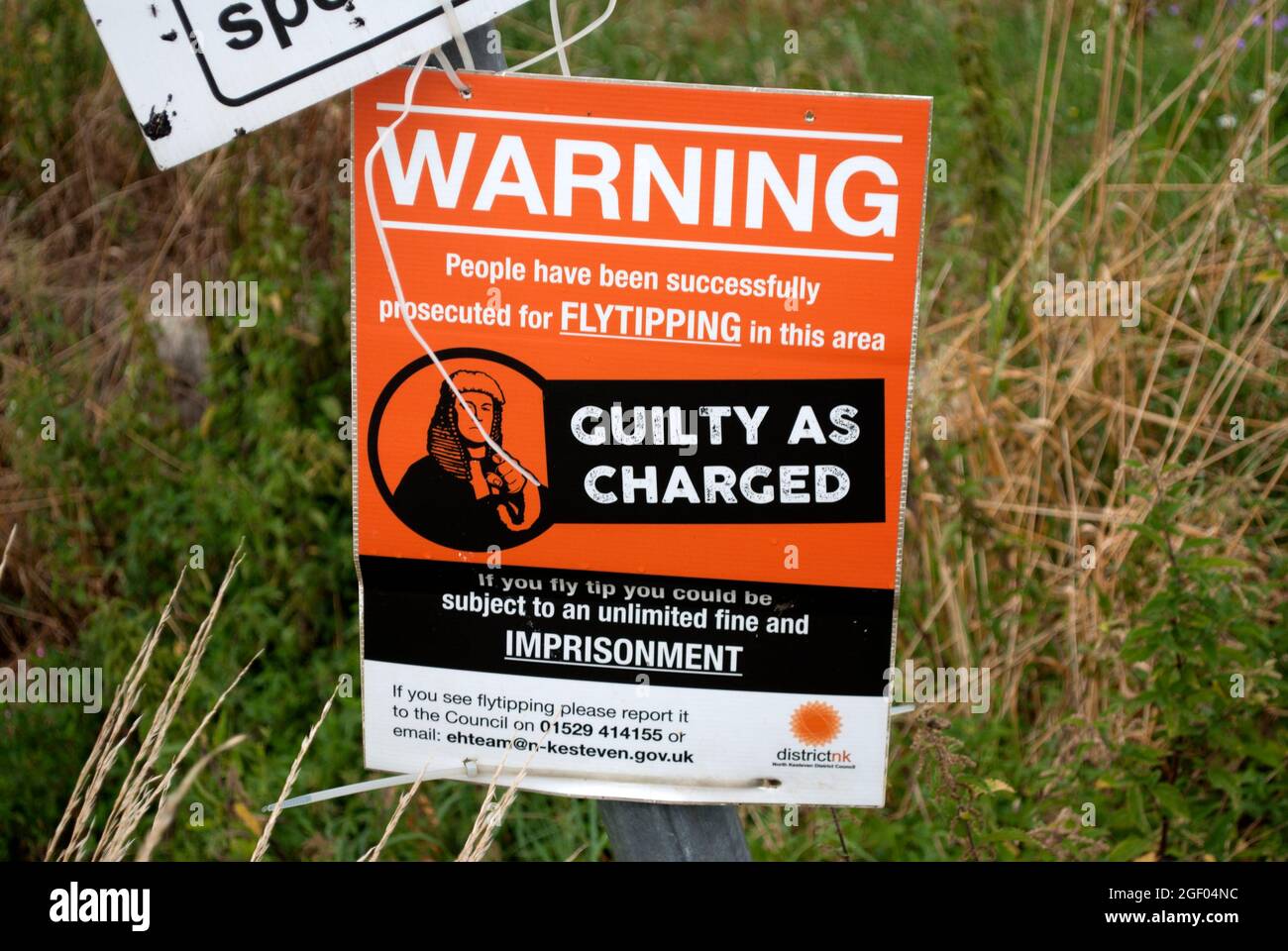 Fly Tipping Warning sign Stock Photo - Alamy