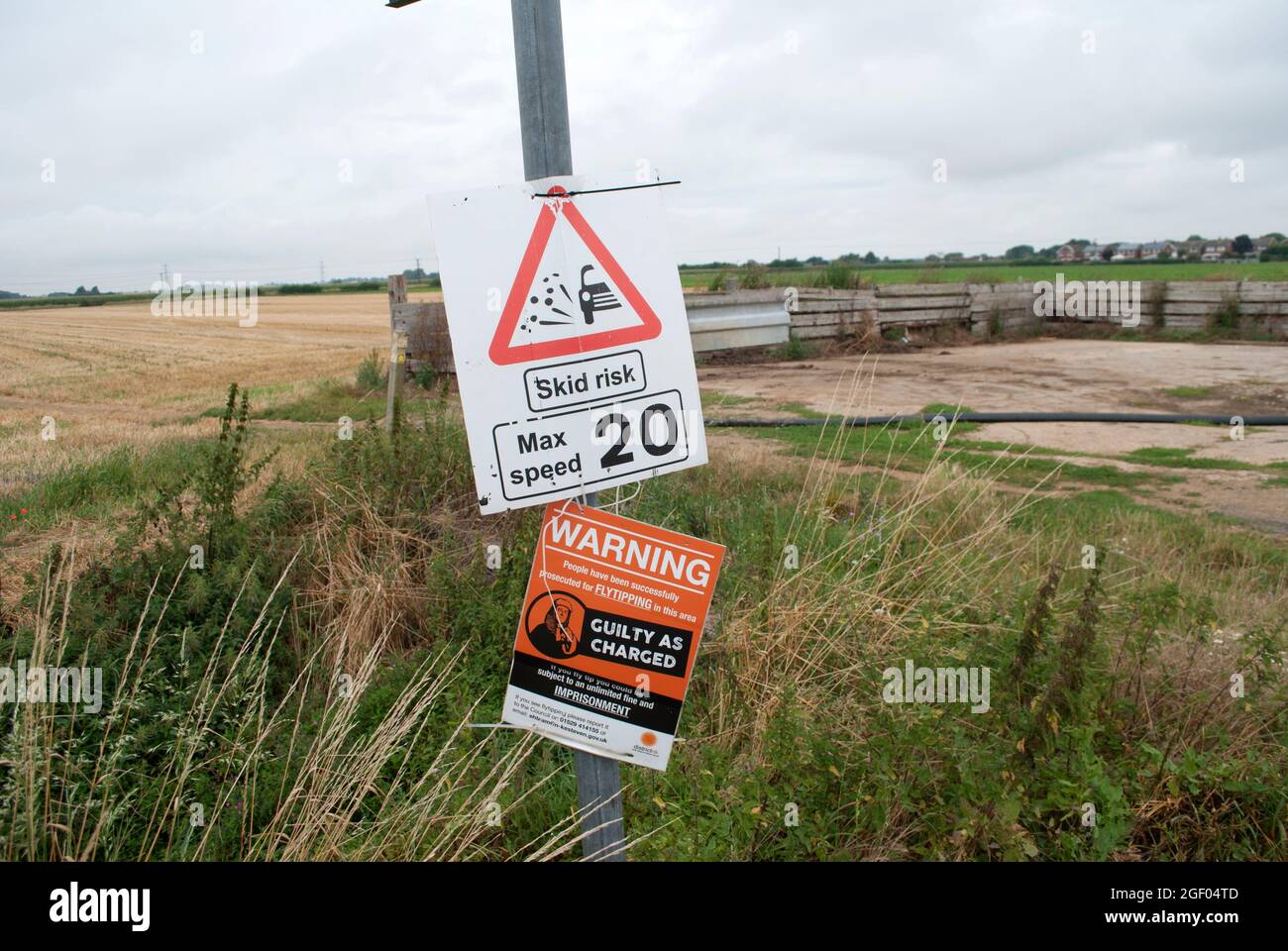 Skid Risk Max Speed 20 Sign and Warning Fly Tipping Sign on Public ...