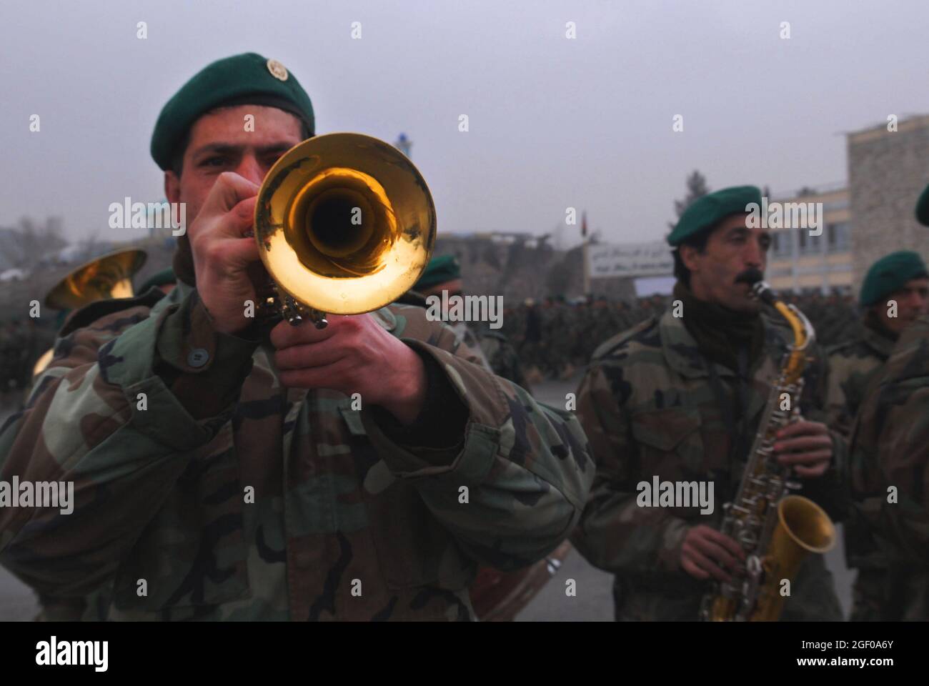 A bandmember of the Afghan national army plays his trumpet during the ...