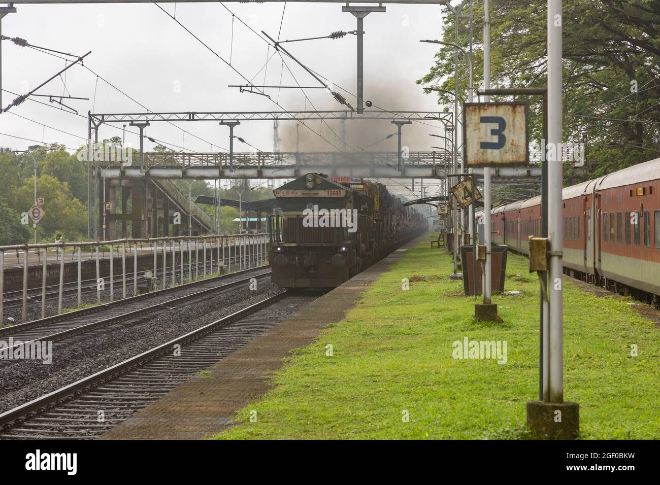 Ro-Ro (Roll On Roll Off) train carrying trucks crossing at Sawantwadi ...