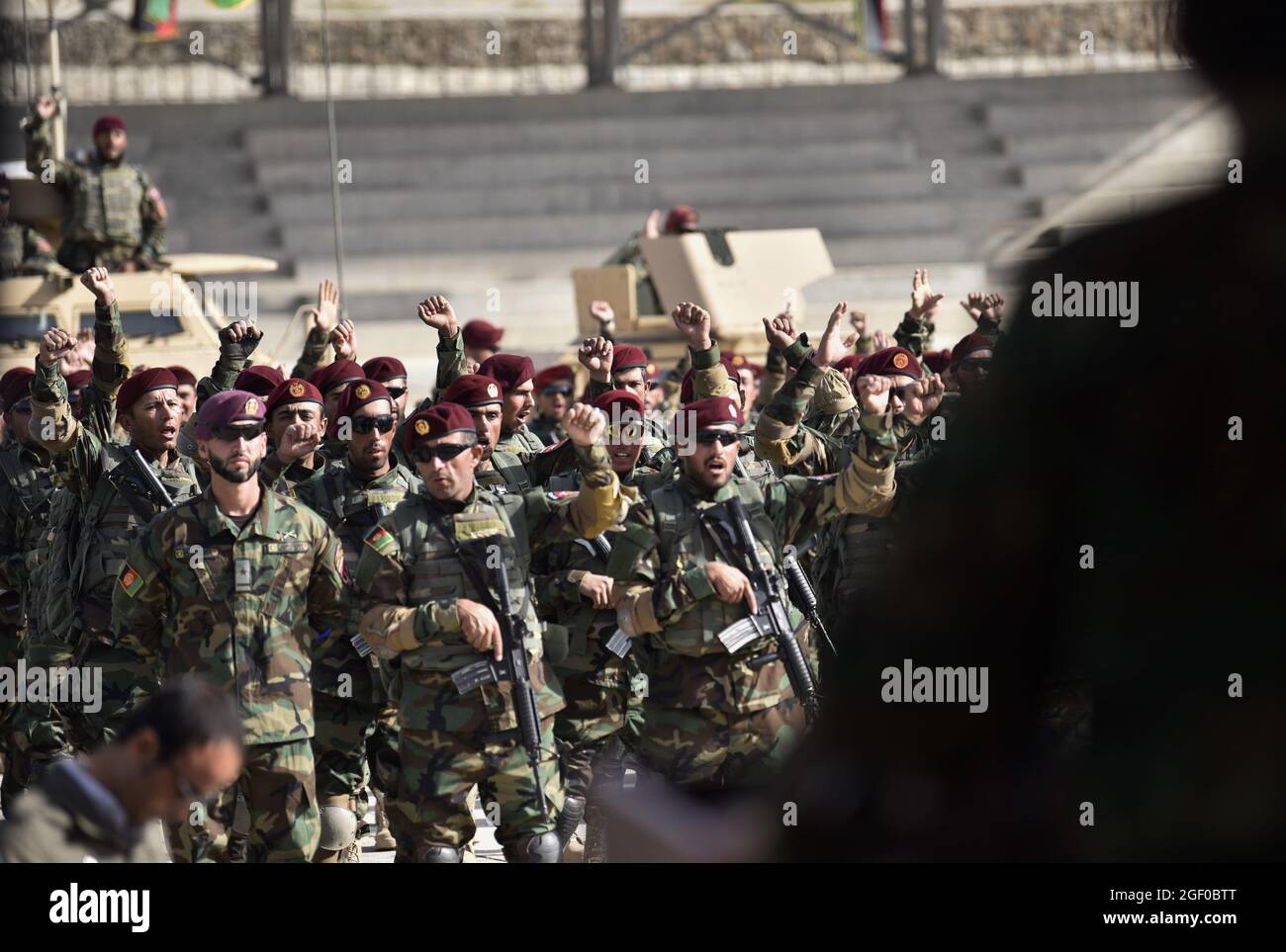KABUL, Afghanistan -- Recently graduated Commandos cheer on their ...
