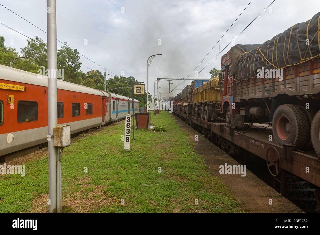 Ro-Ro (Roll On Roll Off) train carrying trucks crossing at Sawantwadi ...