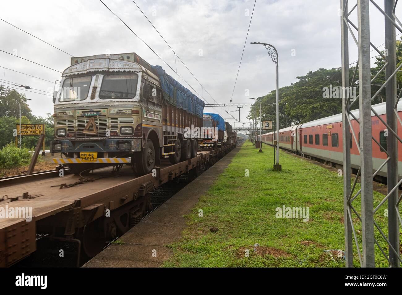 Ro-Ro (Roll On Roll Off) train carrying trucks crossing at Sawantwadi ...