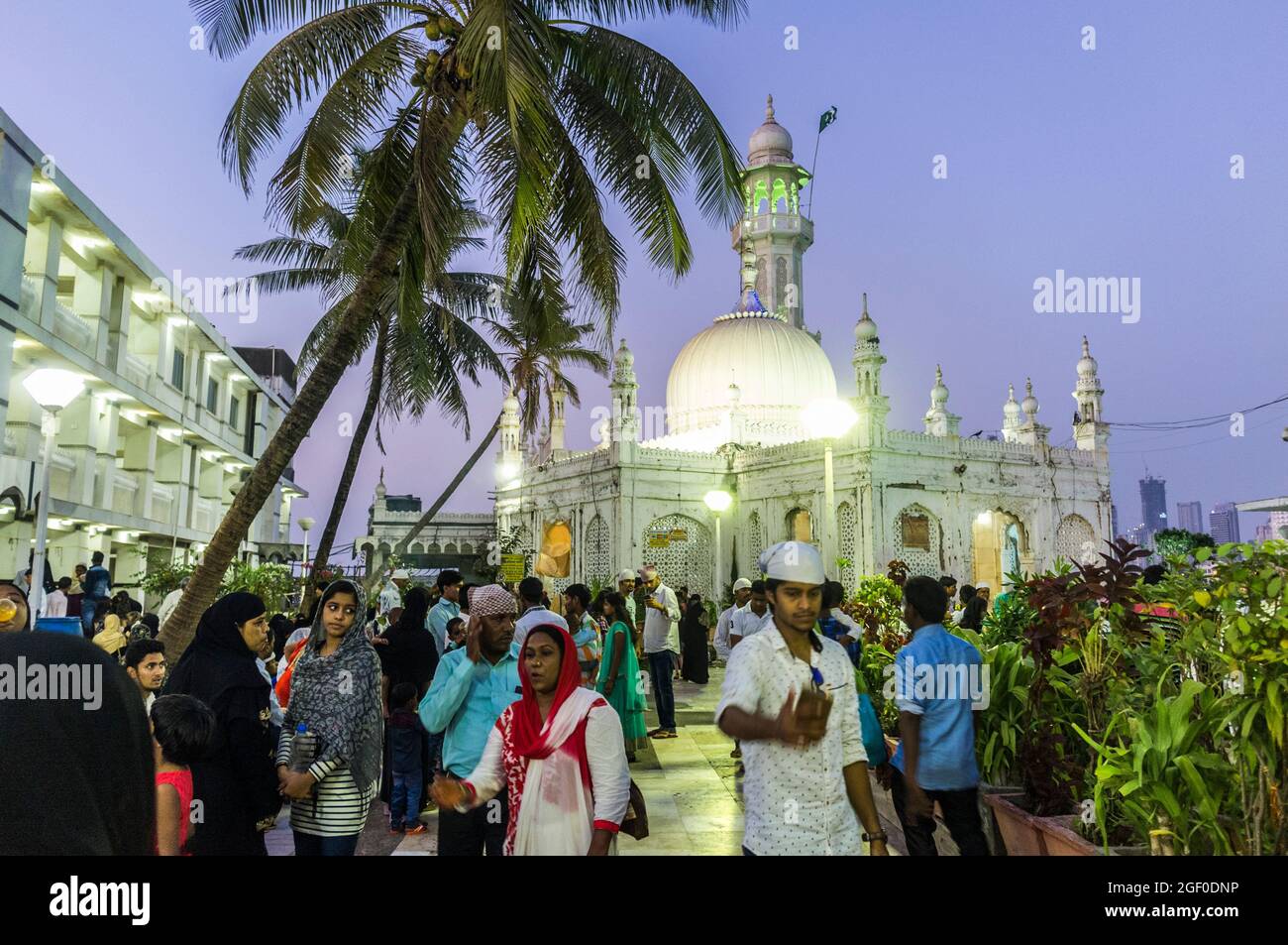 Mumbai, Maharashtra, India : Pilgrims gather at twilight inside the ...