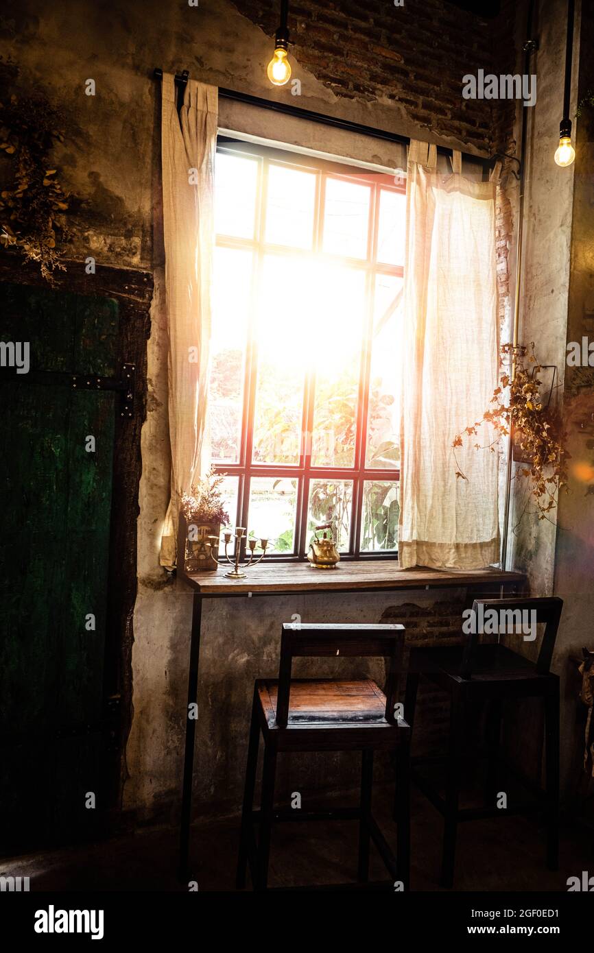 Golden light through window inside room in the morning. Hommie house ...